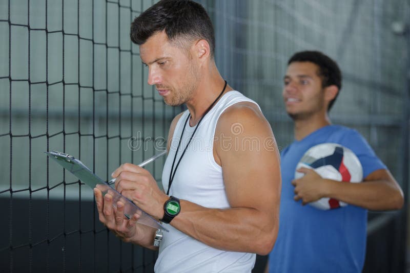 Portrait Coach on Football Field Stock Image - Image of determination ...