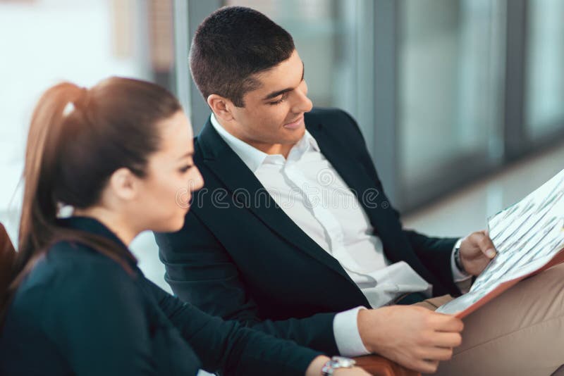 Portrait of Colleagues Looking at Documents Stock Photo - Image of ...