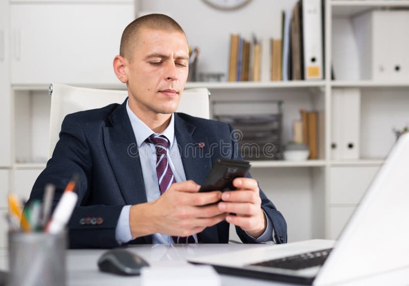 Portrait of the Head of the Company Working in the Office at the ...