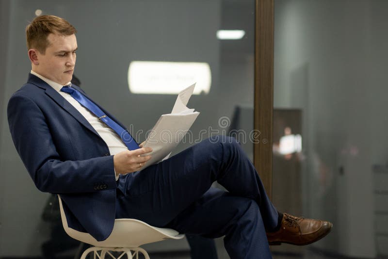Portrait of Concentrated Lawyer Working at Workplace with Documents in ...