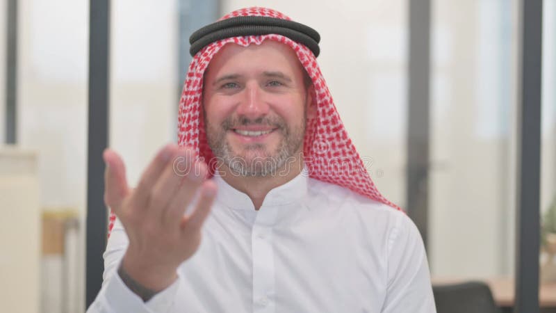 Portrait of Confident Muslim Man Inviting People Stock Video - Video of ...