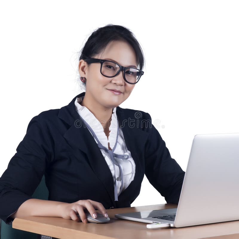 Portrait Of Confident Business Woman Sitting At The Table And Working ... Portrait Of Confident Business Woman Sitting At The Table And Working ...