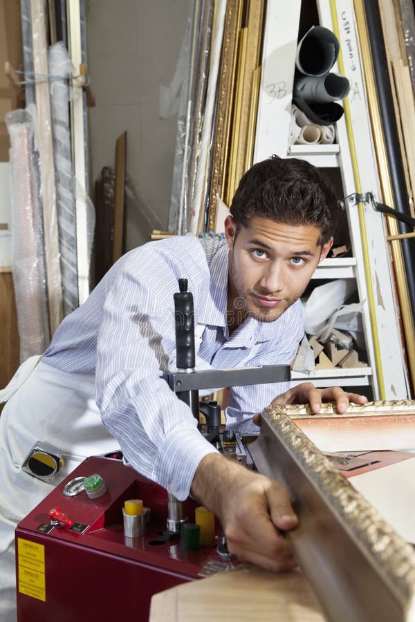 Portrait of a Confident Craftsman Working on Picture Frame Stock Image ...
