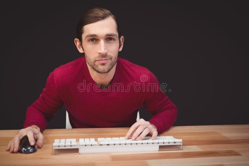 Portrait of Confident Creative Businessman Sitting at Desk Stock Image ...