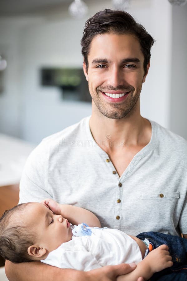 Confident Father and Teenage Son with Shaving Foam on Faces are Looking ...