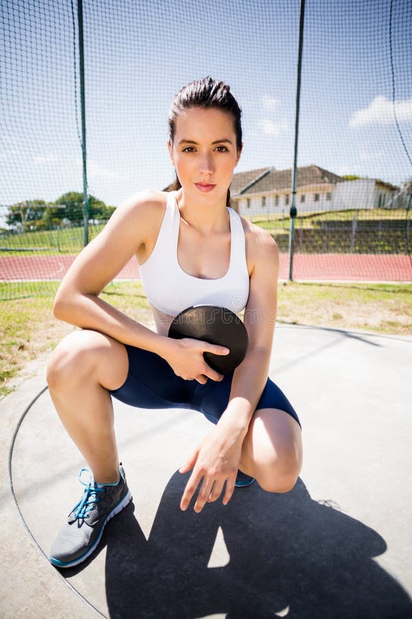 Portrait of Confident Female Athlete Holding a Discus Stock Image ...