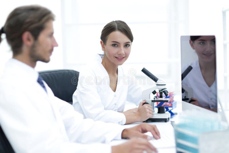 Lab Expert Working on a Test Using Microscope Stock Image - Image of ...