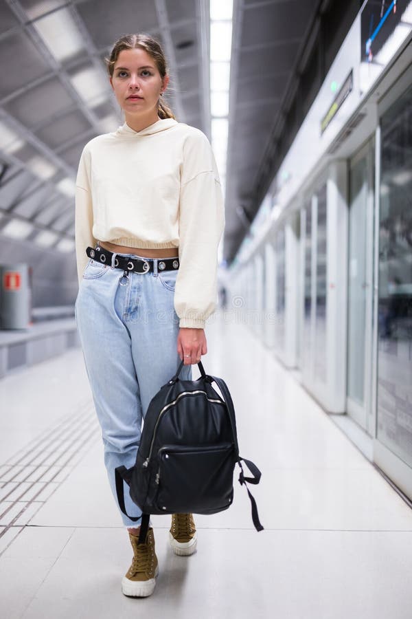 Portrait of a Confident Girl Walking on a Subway Platform Stock Photo ...
