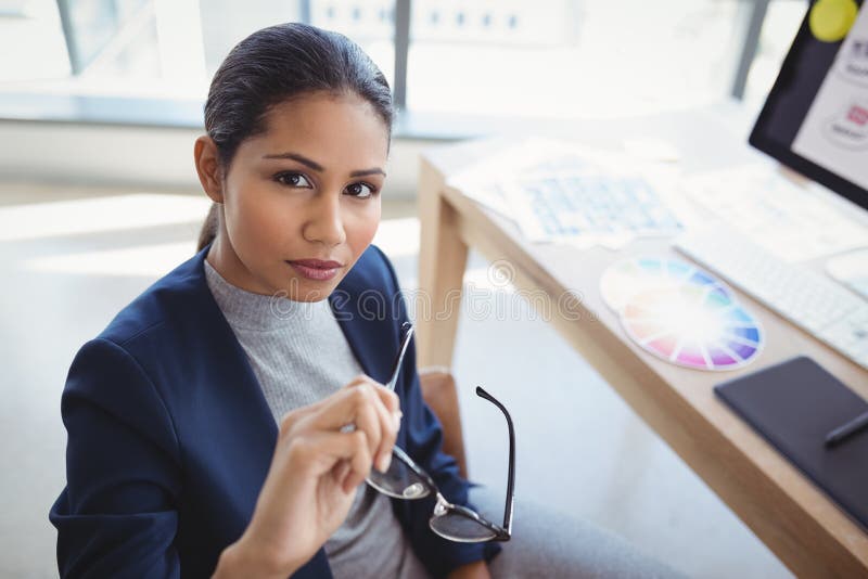 Portrait of Confident Graphic Designer Sitting at Desk Stock Image ...
