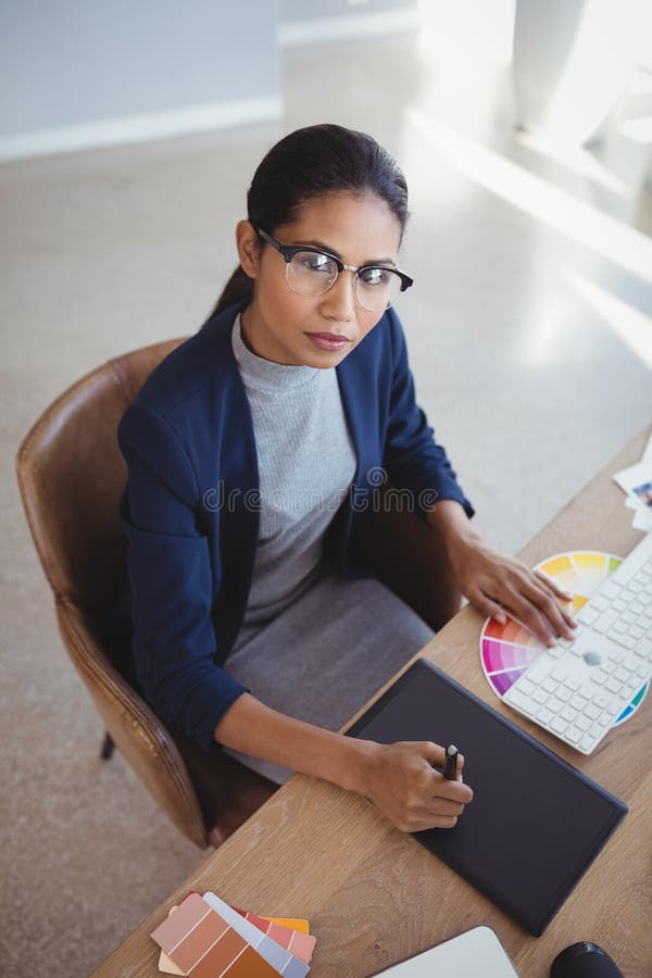 Portrait of Confident Graphic Designer Working at Desk Stock Photo ...
