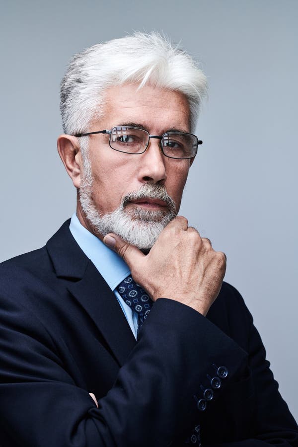 Portrait of Confident Mature Businessman with Serious Face and Gray ... Portrait of Confident Mature Businessman with Serious Face and Gray ...