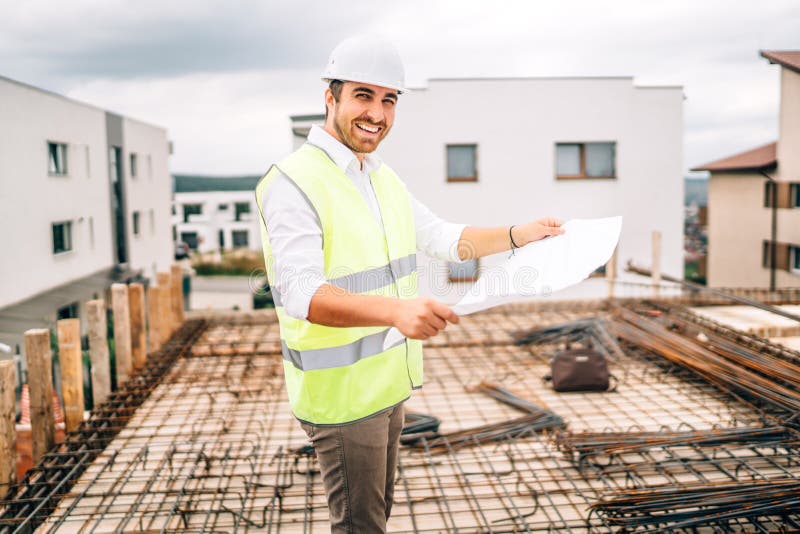 Confident and Smiling Man, Engineer Working on Construction Site Stock ...