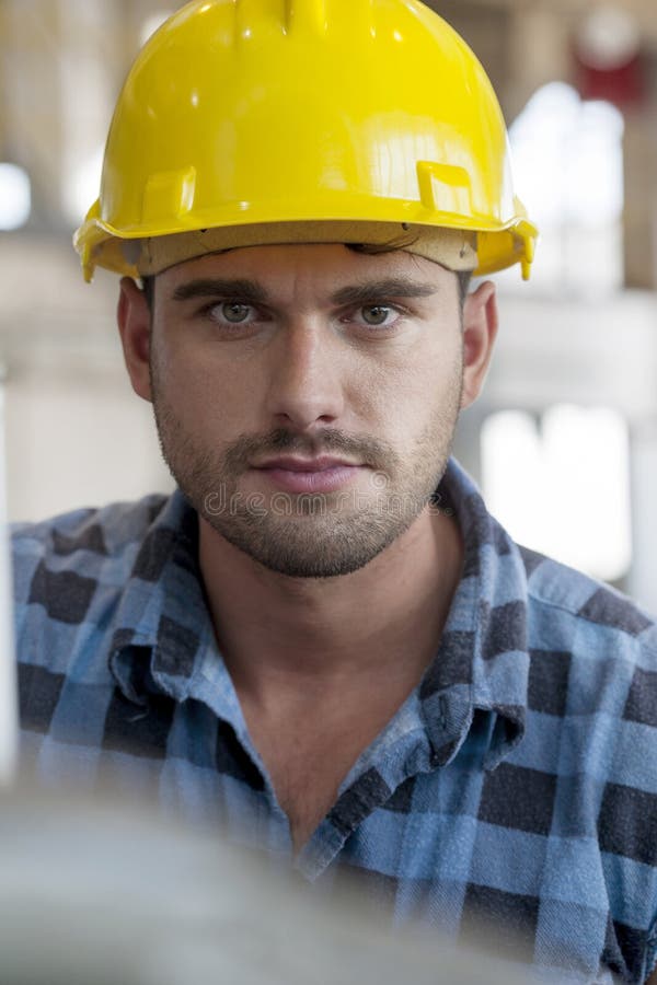 Portrait of Confident Young Male Worker in Industry Stock Image - Image ...