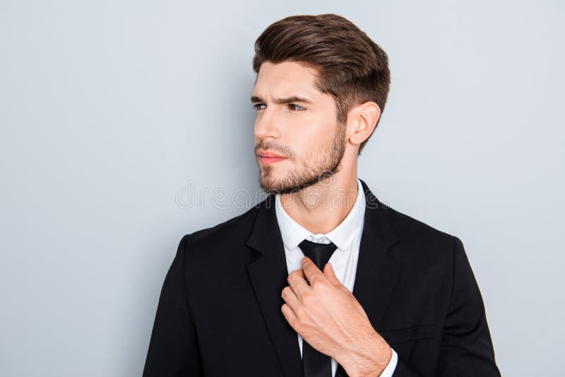 Portrait of Confident Young Man Correcting His Tie Stock Photo - Image ...