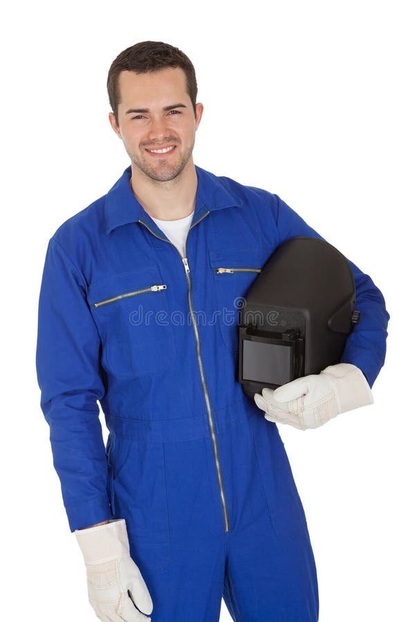 Young Guy Welder in a Checkered Red Shirt Welds a Stainless Steel Pipe ...