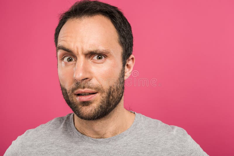 Portrait of Confused Man Looking at Camera, Isolated Stock Image ...