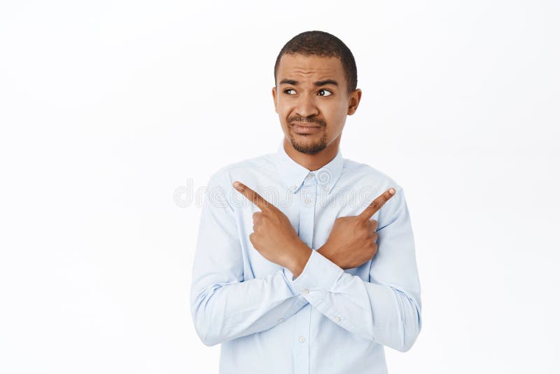Portrait of Confused Office Worker, Young Man Pointing Sideways, Cannot ...