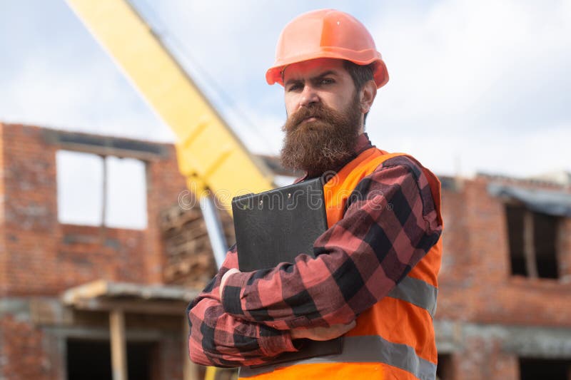Portrait of Construction Builder. Builder Worker in Helmet Posing on ...