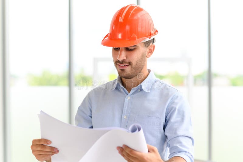 Portrait of Construction Engineer Manager Workers in Orange Hardhat and ...