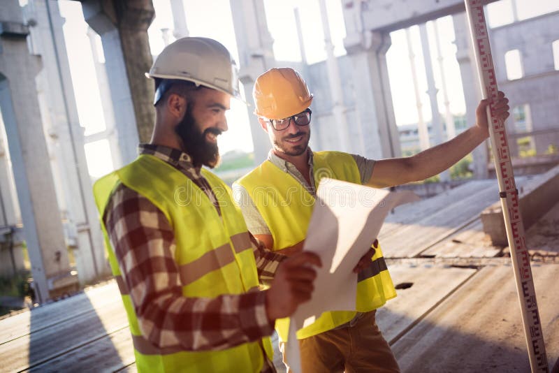 Portrait of Construction Engineers Working on Building Site Stock Photo ...