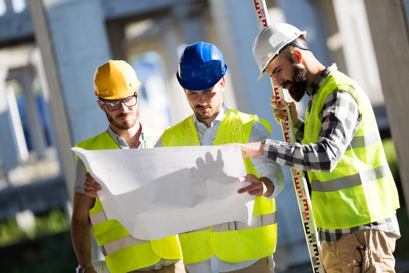 Portrait of Construction Engineers Working on Building Site Stock Photo ...