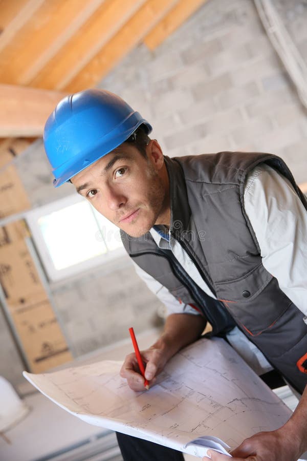Portrait of Construction Manager Reading Blueprint Stock Image - Image ...