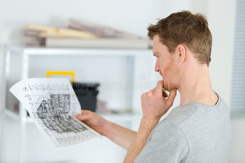 Portrait Construction Worker Checking Documents Stock Image - Image of ...
