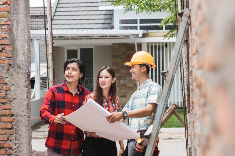 Construction Worker with the House Owner Stock Photo - Image of ...