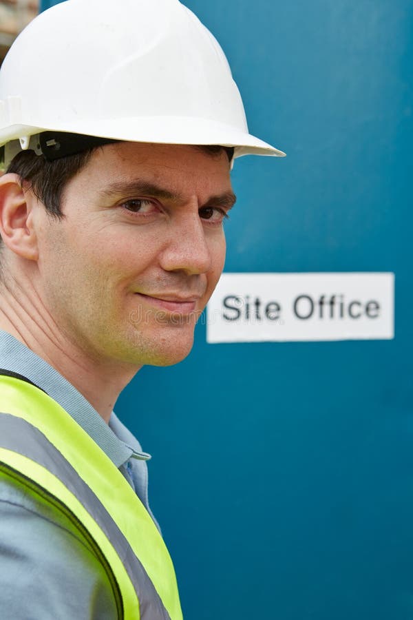 Portrait of Construction Worker on Building Site Looking at House Plans ...
