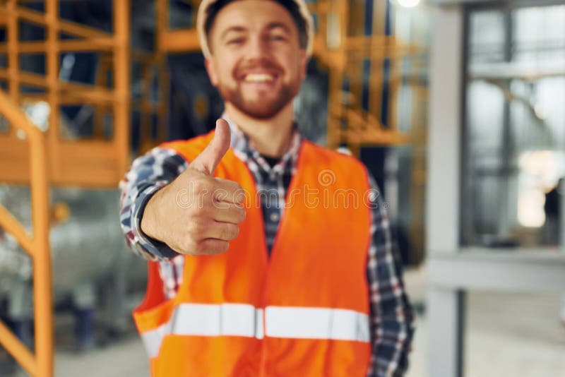 Portrait of Construction Worker in Uniform is in the Factory Stock ...