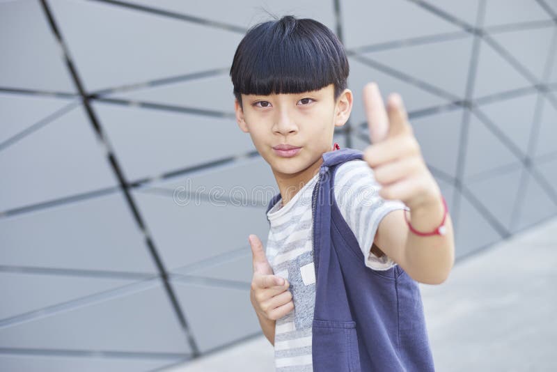 Portrait of Cool Asian Kid Posing Outdoors Stock Photo - Image of asian ...