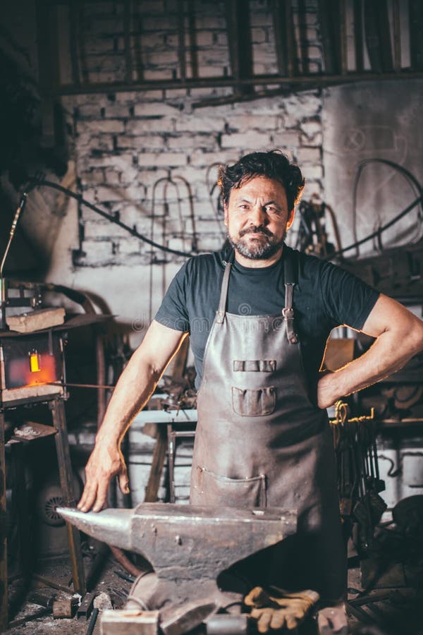 Cool Blacksmith Portrait in Workshop Stock Image - Image of beard, hand ...