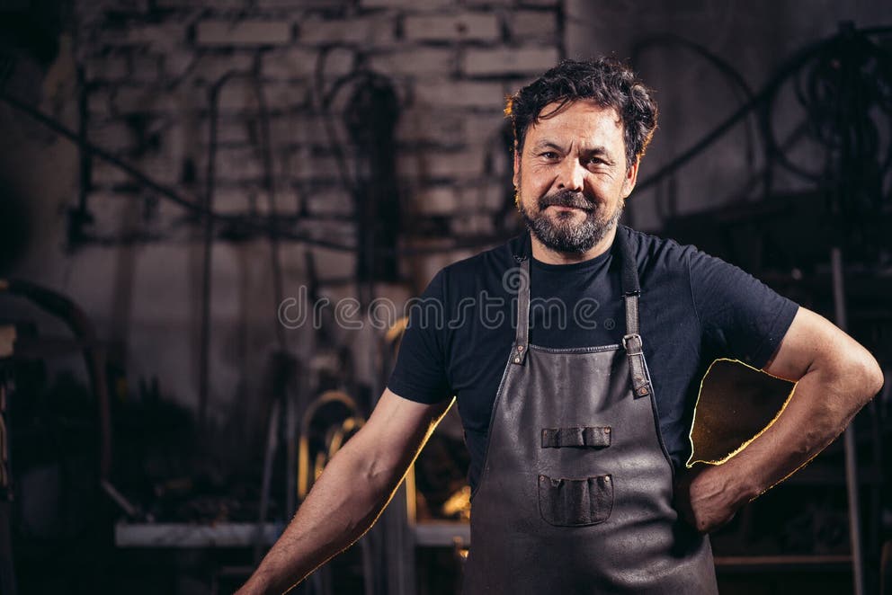 Cool Blacksmith Portrait in Workshop Stock Image - Image of bright ...