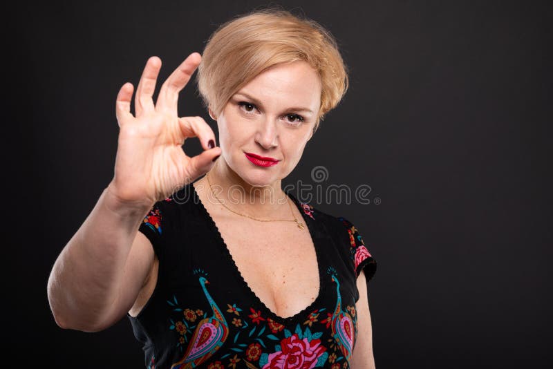 Portrait Of Cool Fashionable Woman Showing Ok Gesture Stock Image
