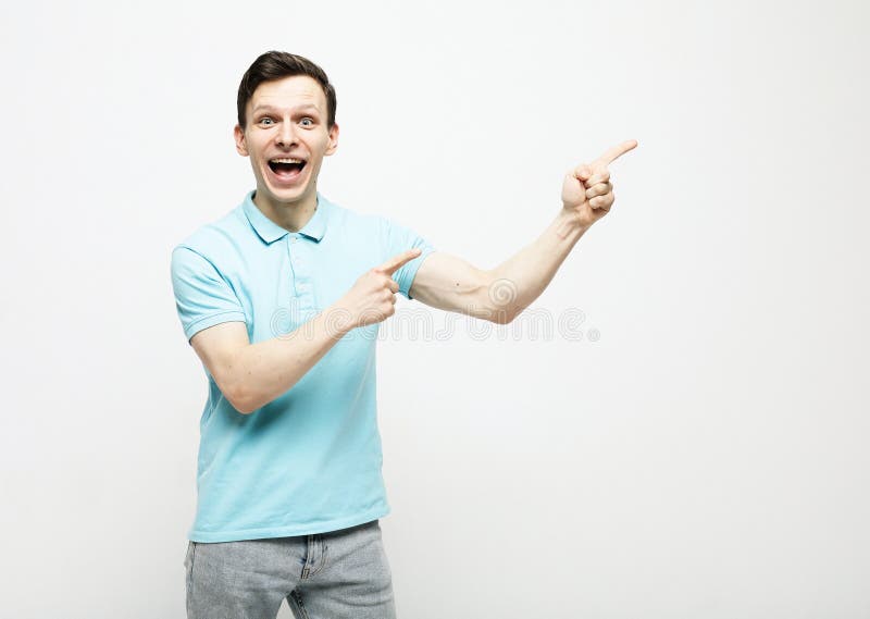 Portrait with Copyspace, Handsome Smiling Man Indicate Showing Empty ...