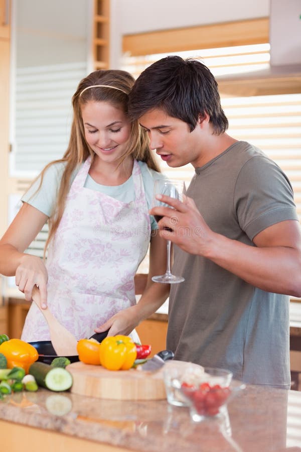 Portrait of a Couple Cooking while Drinking Wine Stock Photo - Image of ...