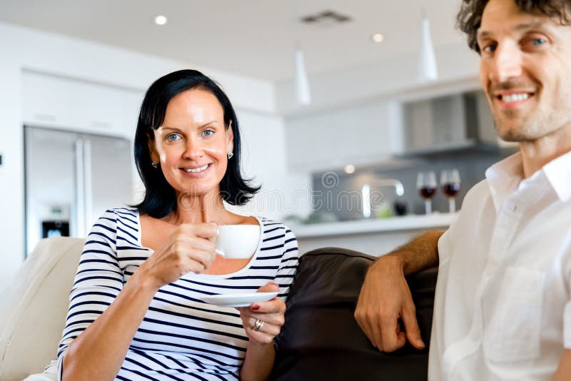 Portrait of a Couple Having Tea at Home Stock Photo - Image of ...