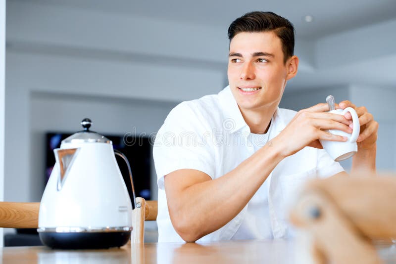 Portrait of a Couple Having Tea at Home Stock Image - Image of ...