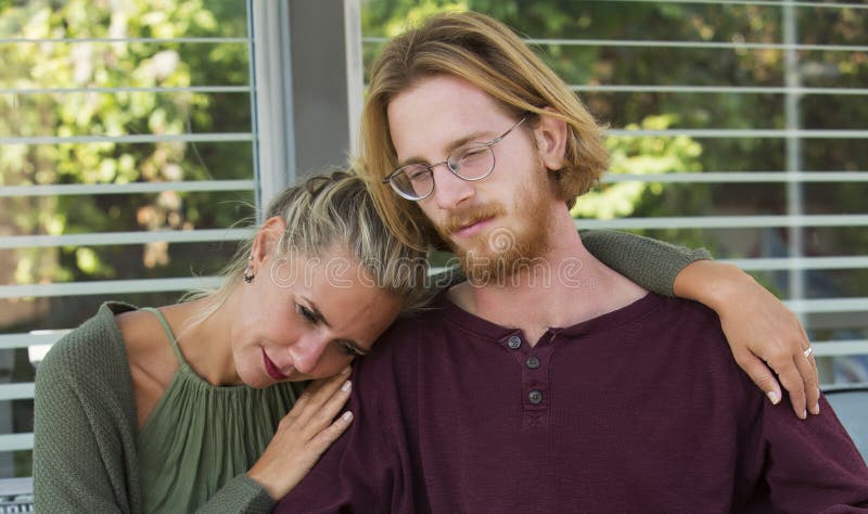 Portrait of Couple Hugging and Looking Sad Stock Photo - Image of ...