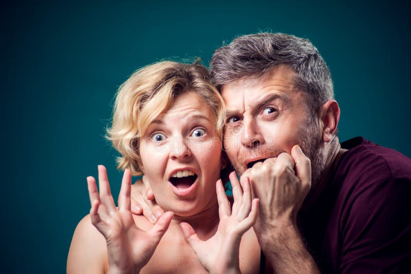 A Portrait of Couple with Scared Faces. People and Emotions Concept ...