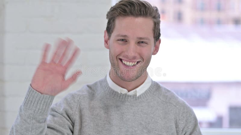 Portrait of Creative Young Man Waving at Camera Stock Image - Image of ...
