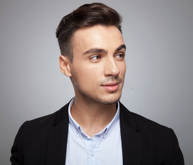 Curious Businessman Laughing and Looking To Side while Sitting Stock ...