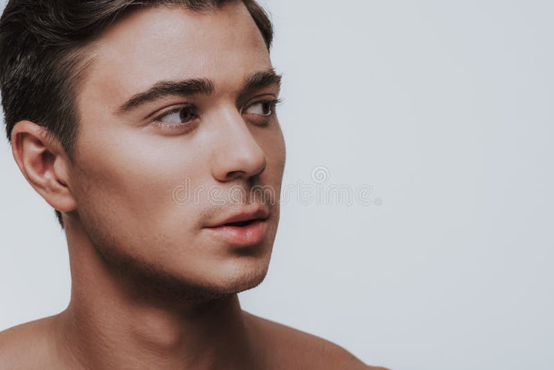 Portrait of Curious Young Man Looking Aside Stock Image - Image of ...