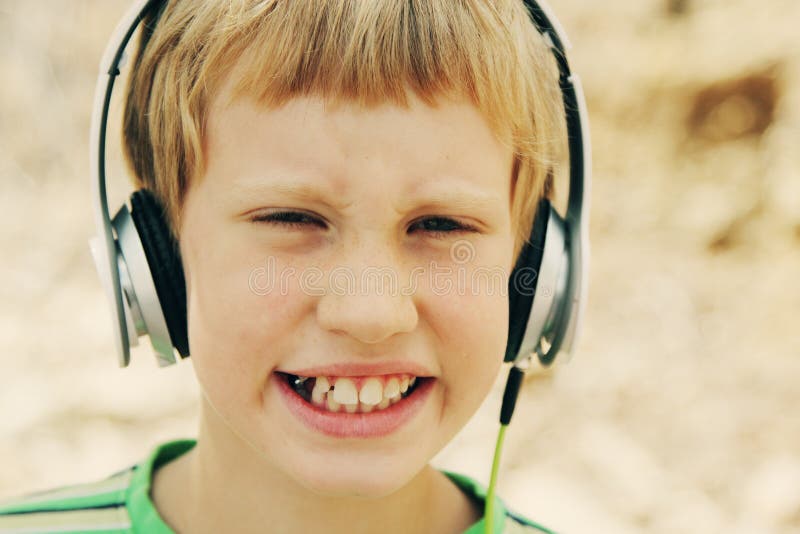 Portrait of Cute Autistic Boy Stock Image - Image of outdoots, music ...