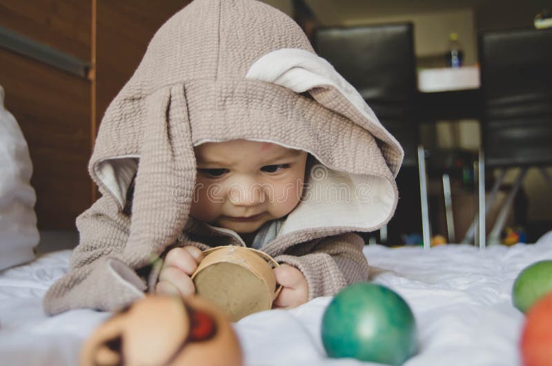 Portrait of the Cute Baby Boy Reaching Out for the Easter Eggs. Easter ...