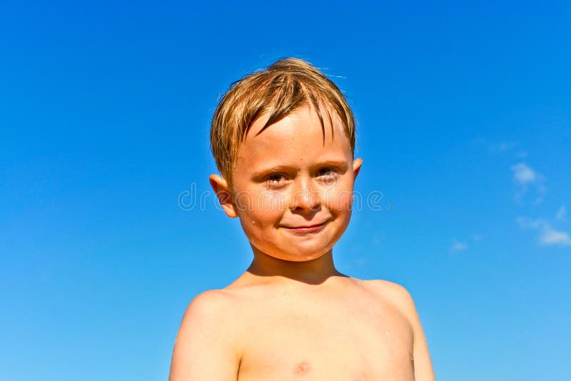 Cute boy at the beach stock image. Image of blue, cute - 136276007