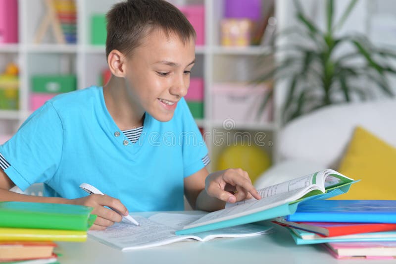 Portrait of Cute Boy Doing Homework at Home Stock Photo - Image of idea ...