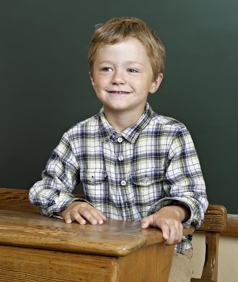 Portrait of Cute Boy Front of a Blackboard. Stock Image - Image of ...