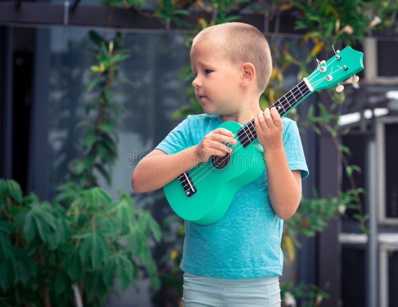 Portrait of a Cute Boy with Ukulele Stock Image - Image of fashion ...