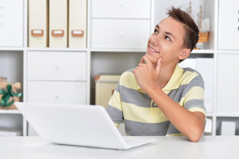 Portrait of Boy Using Laptop in Room Stock Image - Image of laptop ...